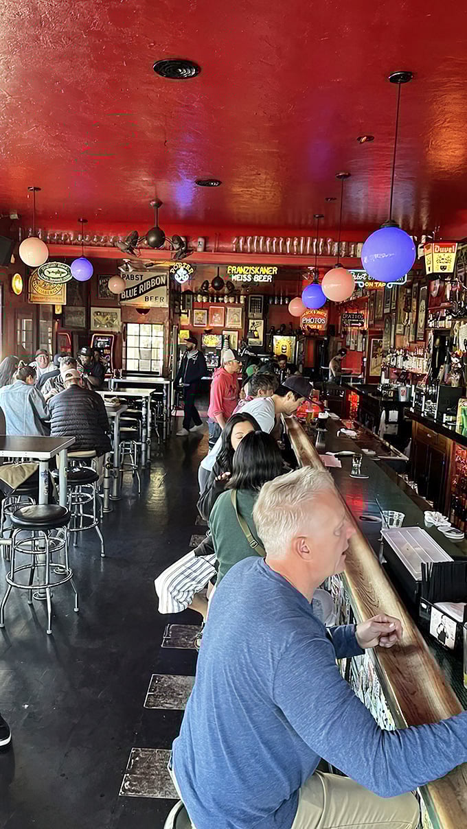 The bar scene looks straight out of "Cheers," where everybody might not know your name yet, but they'll welcome you anyway.