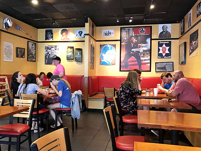 The dining room: where strangers become friends united by the universal language of "mmm." Yellow walls warm as the hospitality inside.