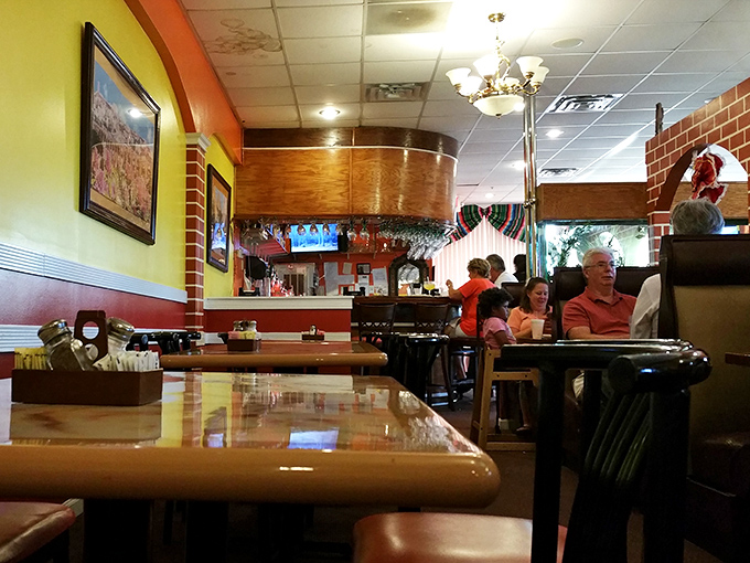 Where Mexican tradition meets Maryland hospitality. The restaurant's interior design creates distinct dining zones that somehow feel both private and part of a larger community celebration.