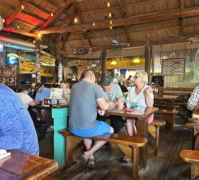 Where locals and visitors mingle over cold drinks and fresh catches&mdash;the universal language of good food bridging all differences.