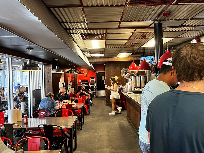 Where chicken pilgrims gather to test their mettle. The industrial-meets-casual vibe keeps the focus squarely where it belongs—on that glorious bird.