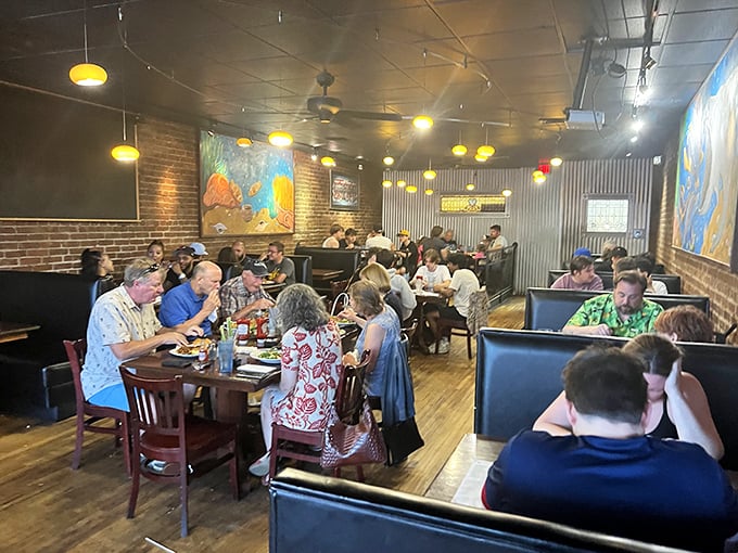 Where seafood brings Pittsburghers together – notice how nobody's talking because their mouths are too busy experiencing maritime bliss.