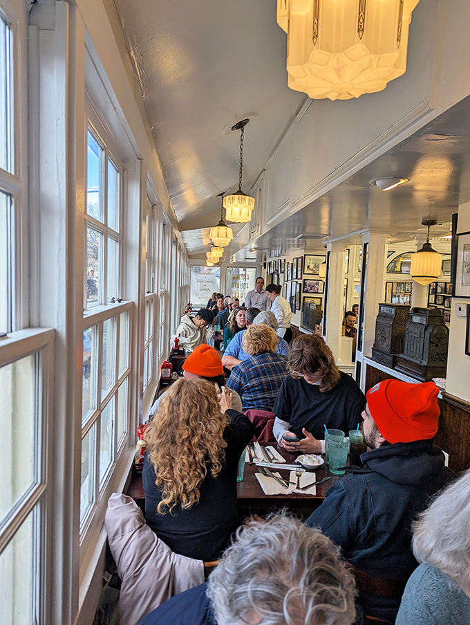 The narrow dining room buzzes with conversation and anticipation&mdash;a community united by the universal language of exceptional sandwiches.