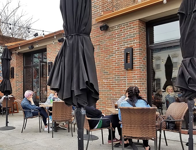 Outdoor dining at The South Side&mdash;where people-watching meets comfort food in Tremont's urban landscape. No filter needed for this Cleveland vignette. 