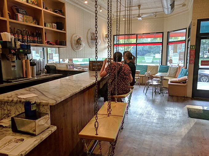 The swing seats at the counter aren't just Instagram bait&mdash;they're time machines transporting adults back to playground days, one gentle sway at a time.