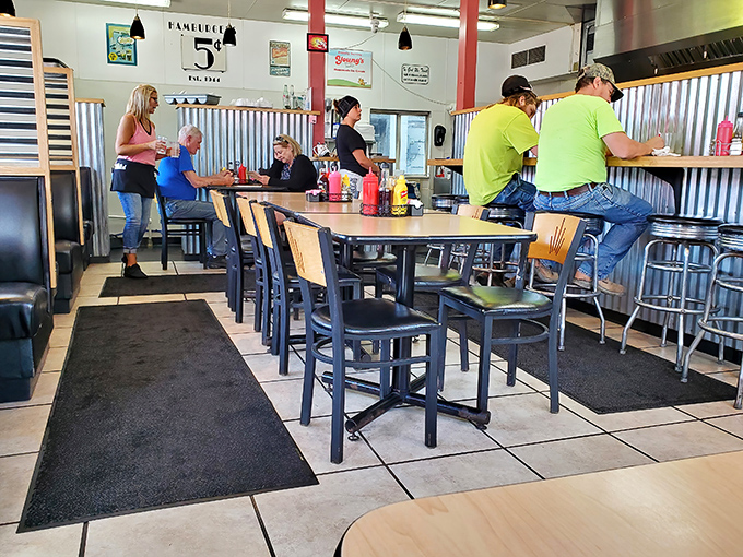 Every small town diner has its rhythm—regulars and staff moving in a choreographed dance that's been perfected over countless cups of coffee.