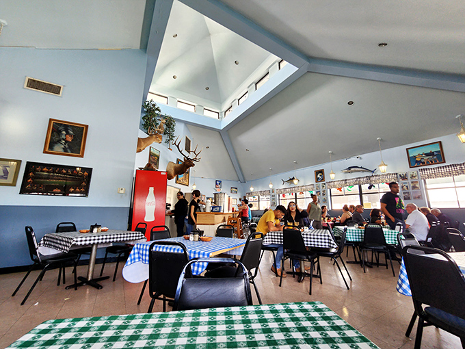High ceilings and natural light transform a simple dining room into a community gathering space where breakfast is serious business.