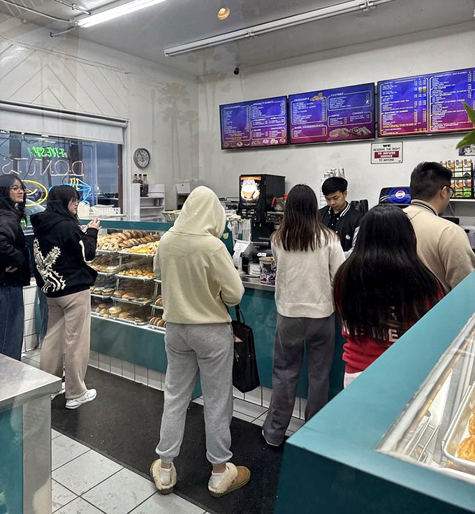 The universal language of anticipation as customers contemplate their selections, each facing the day's most delicious decision.