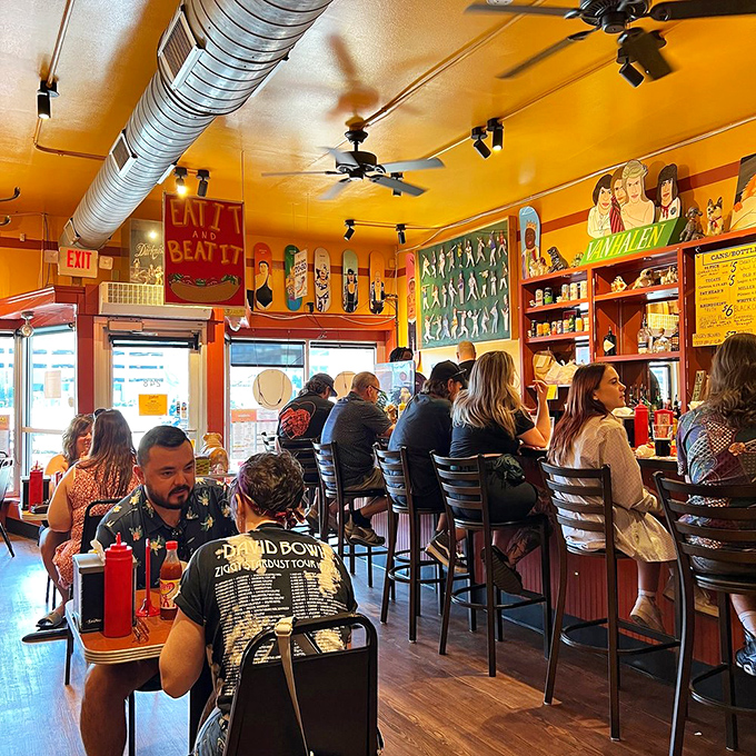 A packed house of diners united in the universal language of hot dog appreciation &ndash; notice nobody's looking at their phones?