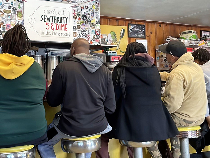 The counter seating isn't just about efficiency&mdash;it's where strangers become friends over shared appreciation of what's happening on their plates.