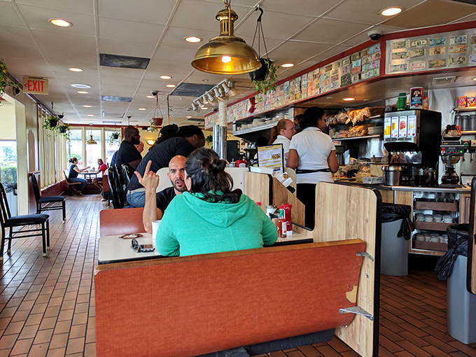 The counter seats &ndash; where solo diners become temporary family and regulars exchange life stories between sips of bottomless coffee.