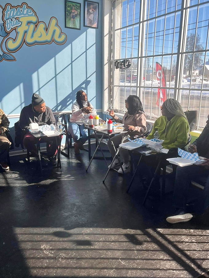 Sunlight streams in as diners gather around simple tables, united by the universal language of "this is really good" head nods.