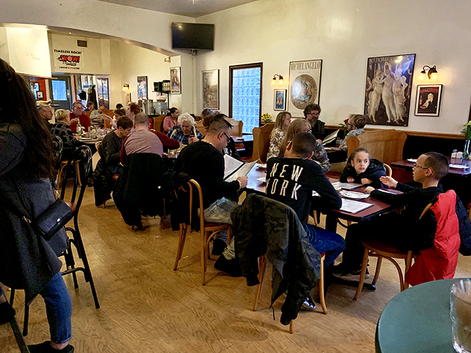 A full house is the best review &ndash; families and friends gathering around tables, creating memories one slice at a time.