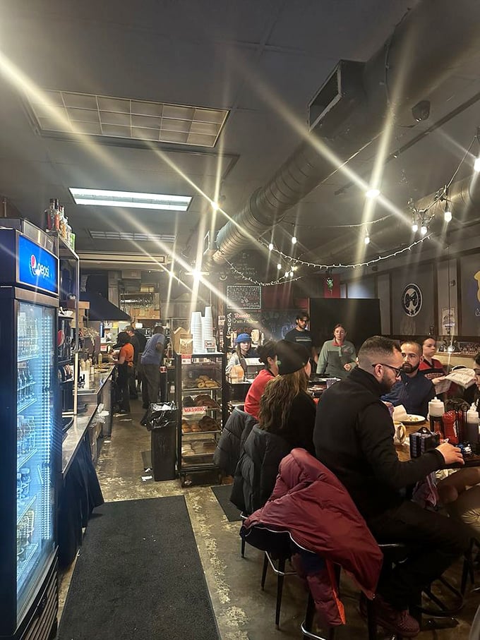 Where locals gather, steam rises from coffee cups, and morning conversations flow as freely as the refills.