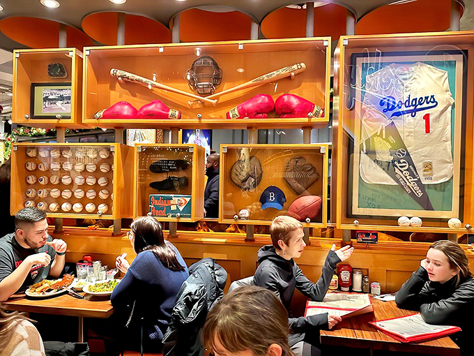 Baseball memorabilia watches over diners like guardian angels of appetite. Even the Dodgers still have a home in Brooklyn.