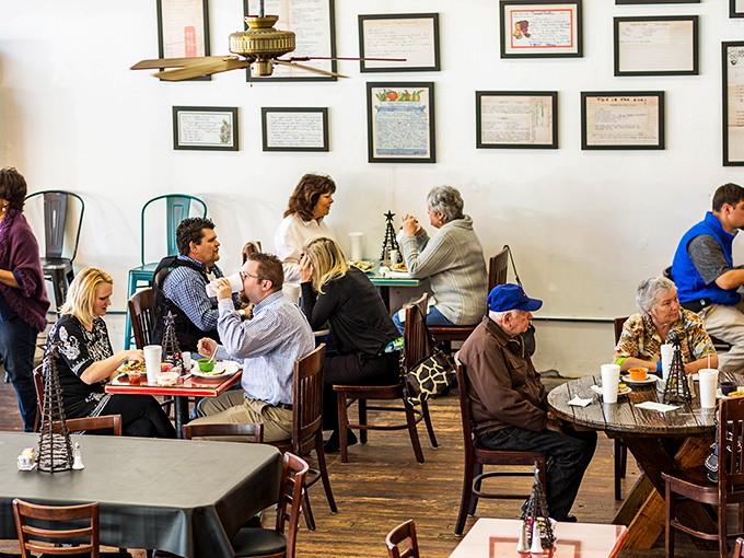 Where strangers become neighbors and neighbors become family. The wall of framed memories tells stories that the cheesecake can't.