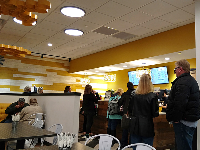 The counter area buzzes with cheese-seeking pilgrims, all drawn by the siren song of perfectly melted cheddar and creative combinations.