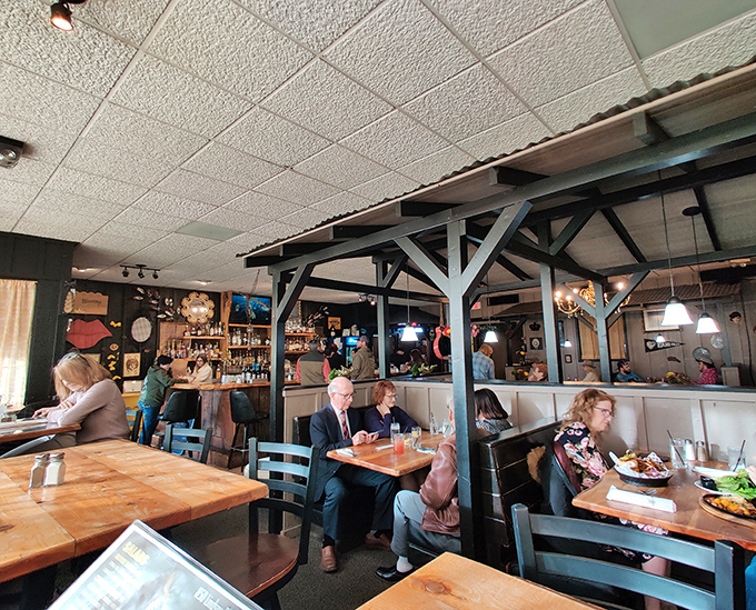 Where strangers become neighbors and neighbors become friends. The dining room hums with the satisfaction of people making good life choices.