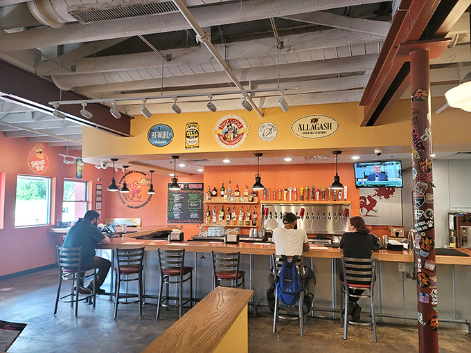 The bar area where chicken enthusiasts gather to discuss important topics like "How are you still standing after ordering the XX Hot?"