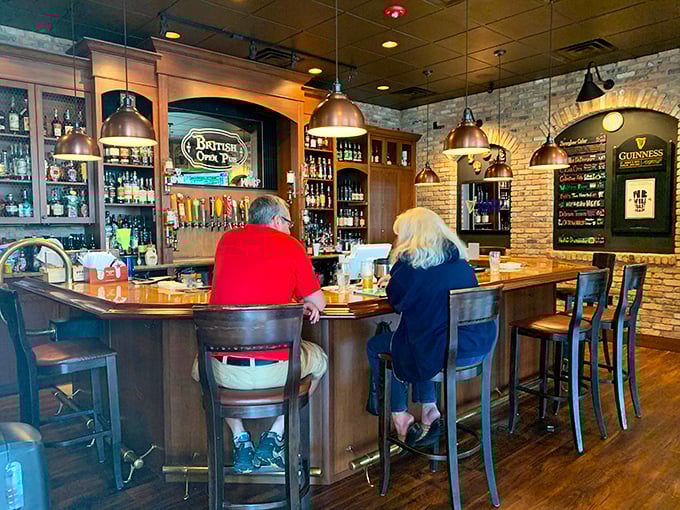 Where locals gather to escape Florida's heat. The curved wooden bar with its lineup of taps creates the heart of this community gathering spot.