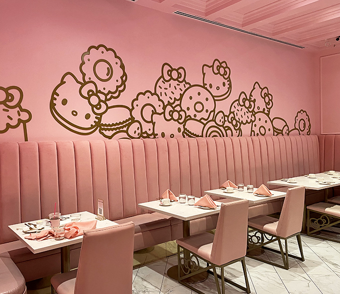 The dining area whispers "luxury" while shouting "fun" with its plush seating and playful wall art. Adult enough for a business lunch, whimsical enough for your inner child.