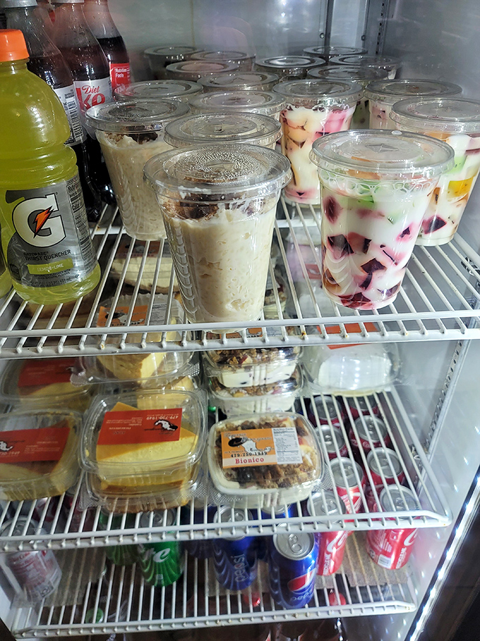 The dessert case beckons with sweet promises. Those fruit cups and creamy treats are the perfect finale to your flavor journey.