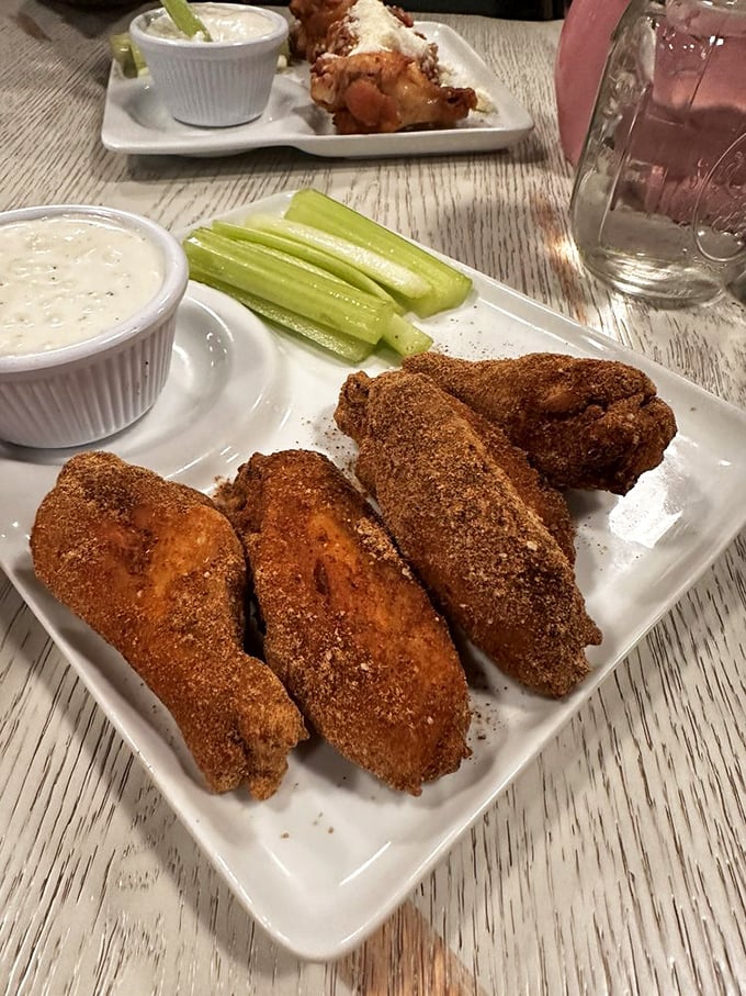 Wings that don't need sauce to make a statement. These dry-rubbed beauties with their crispy coating are the quiet sophisticates of the appetizer world.