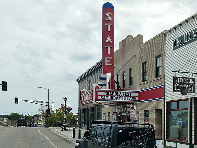 The historic State Theater's neon sign glows like a beacon of culture in the wilderness, proving Ely isn't just about outdoor adventures.
