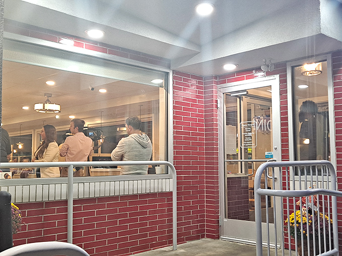 The entrance to flavor town isn't just welcoming&mdash;it's framed in classic red brick and illuminated promise. Even the railings look excited to be here.