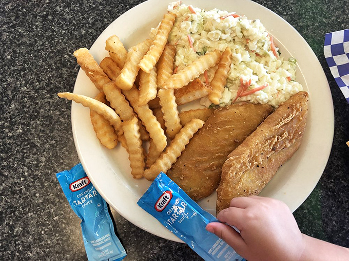 Coleslaw that actually deserves a place on your plate, alongside golden fish and those signature crinkle fries&mdash;a trio of simple perfection.