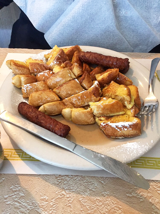 French toast that makes you question why you ever eat anything else for breakfast. Those sausages are the perfect savory counterpoint.
