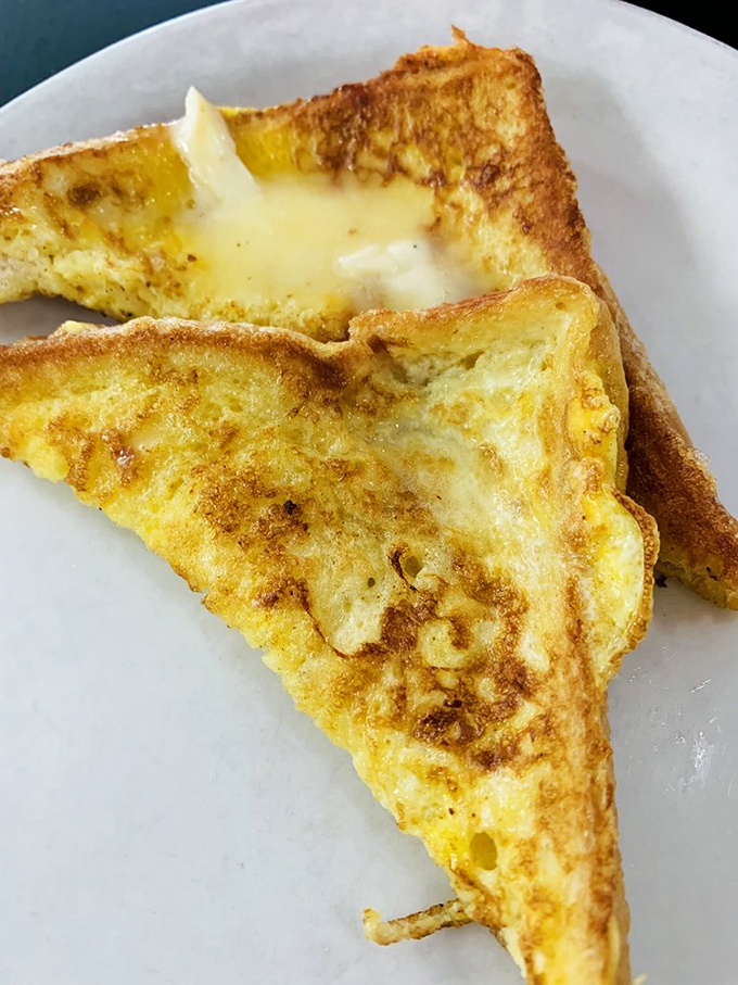 French toast that makes you wonder if bread's highest calling was always to be dipped in egg batter and griddled to golden perfection.