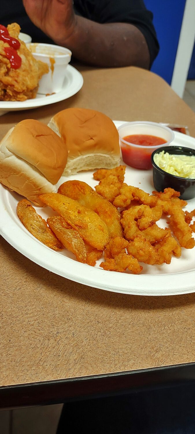 Crispy fried shrimp, golden potato wedges, and soft dinner rolls provide you with a classic and satisfying comfort food meal.
