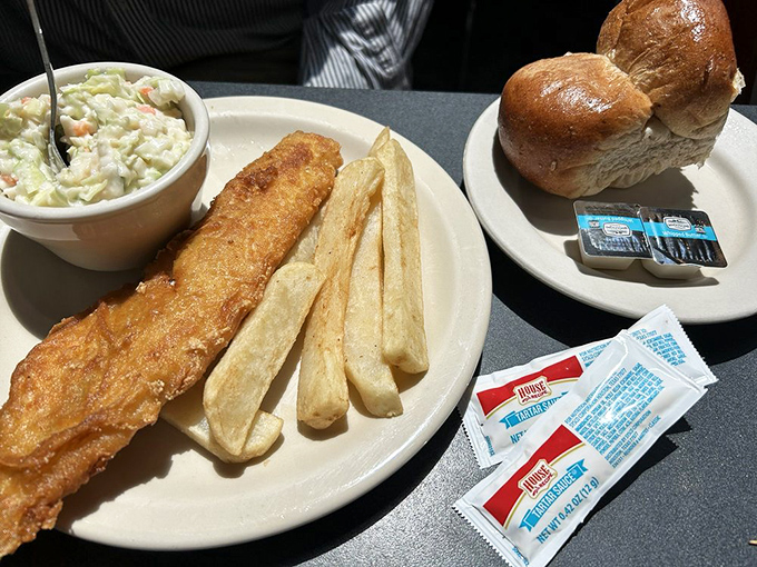 Fried haddock that's traveled a long way to reach perfection in Indiana. Those fries aren't just sides—they're worthy companions.