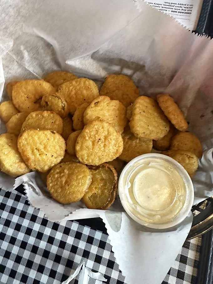 Fried pickles: where tangy meets crispy in a basket of Southern ingenuity that makes you wonder why we ever ate pickles any other way.