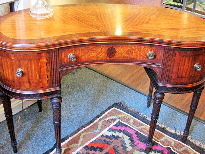 This kidney-shaped writing desk with satinwood inlay isn't just furniture&mdash;it's where someone once penned love letters long before text messages existed.