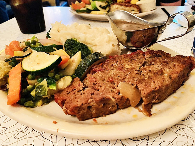 Meatloaf that would make your mother jealous. Served with gravy and sides that remind you why comfort food earned its name.