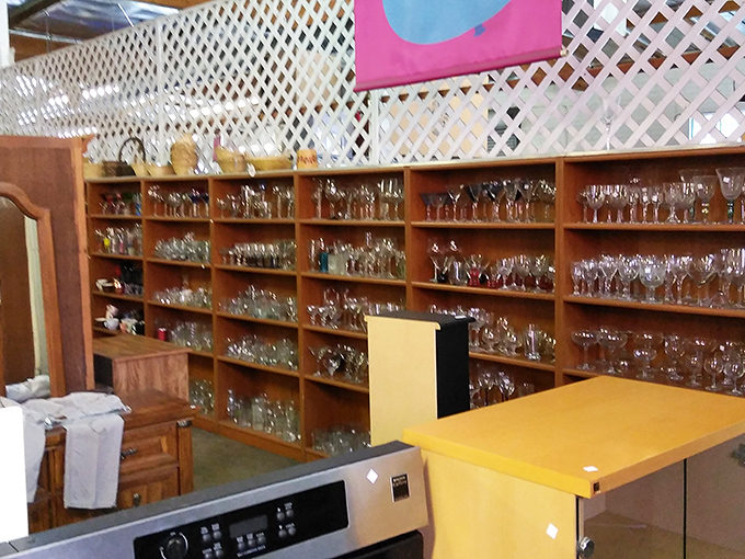 Crystal clear organization in the glassware section makes finding that perfect vintage cocktail set or missing piece from Grandma's collection surprisingly easy.