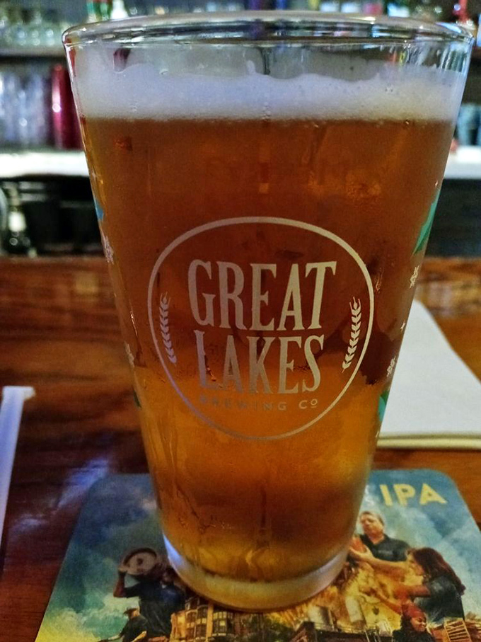 This golden Great Lakes brew isn't just beer - it's liquid sunshine in a glass, the perfect companion to Zip's legendary burgers.
