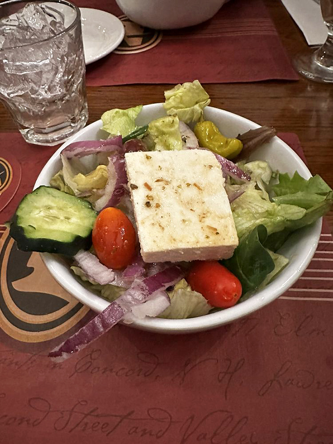 A proper Greek salad with a slab of feta that means business. The Mediterranean vacation your taste buds have been waiting for.