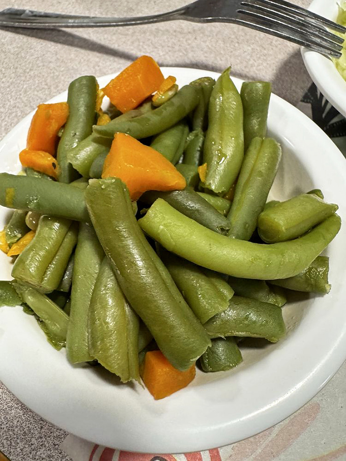 Green beans that haven't been overthought or "elevated"&mdash;just properly cooked vegetables that remember their purpose on the plate.