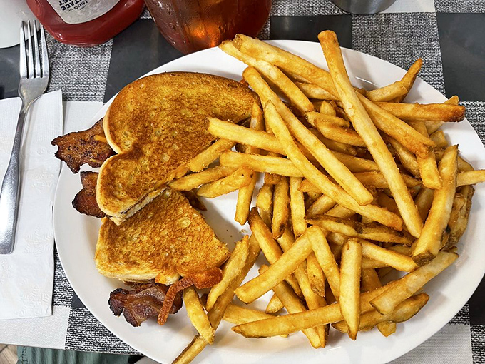 The humble grilled cheese and fries—proof that sometimes the simplest combination can trigger more nostalgia than a high school reunion.