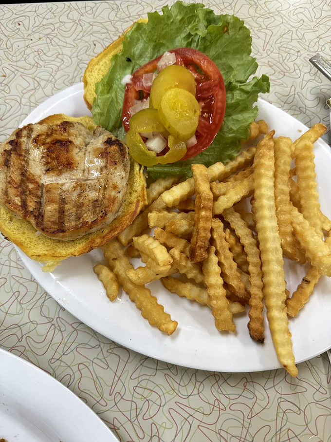 A classic grilled chicken sandwich with crinkle-cut fries&mdash;proof that lunch doesn't need to be complicated to be magnificent.