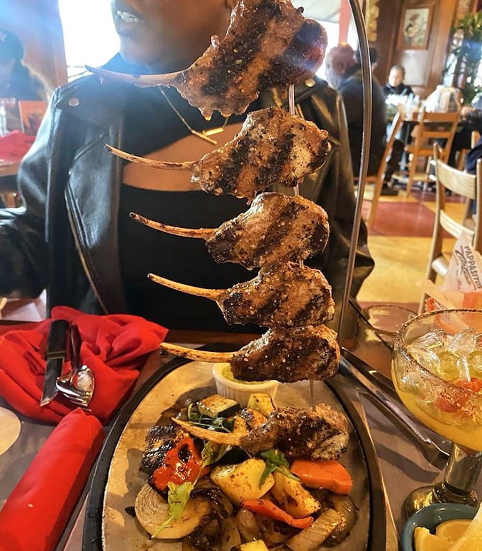 These lamb chops aren't just served&mdash;they're presented like meaty exclamation points on a skewer, a carnivore's dream standing at attention.