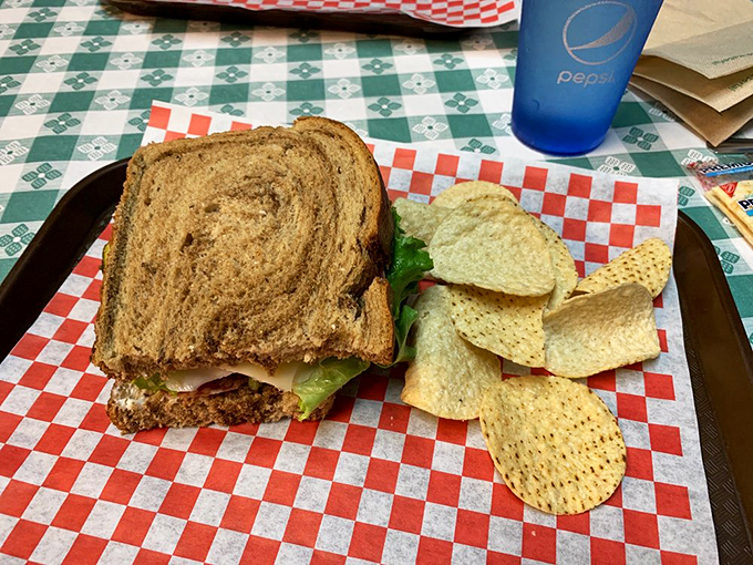 Sometimes half a sandwich is all you need &ndash; especially when it's this good. The checkered paper is like a finish line flag for your taste buds.