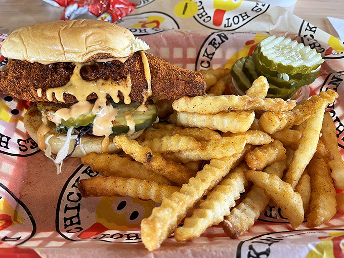 Crinkle-cut fries that actually taste like potatoes! They're the unsung heroes, ready to cool your palate between bites of fiery chicken.