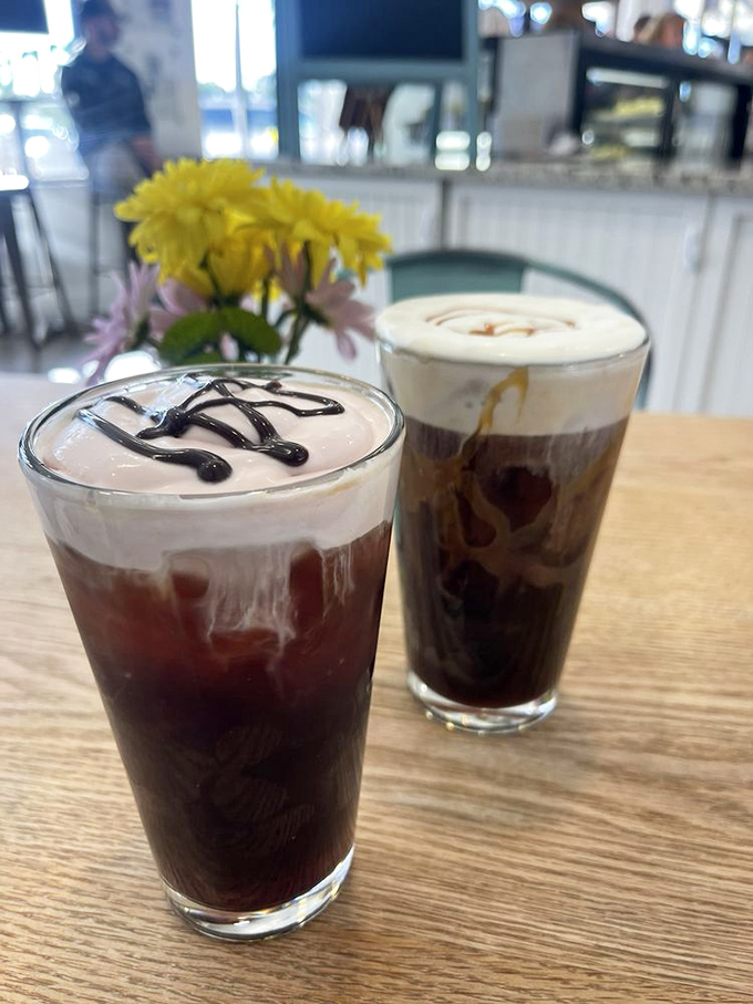 Coffee art that belongs in a museum, not just in your stomach—these iced coffees are the perfect cheesecake sidekicks.