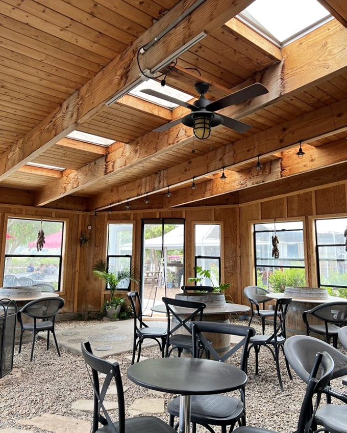 Skylights flood this dining space with California sunshine, creating a greenhouse effect that nurtures both plants and appetites.