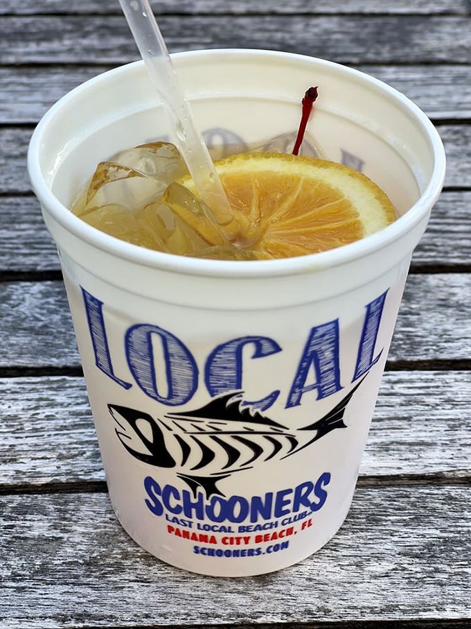 The "Local" cup isn't just holding a refreshing beverage – it's advertising your excellent taste in beachside watering holes to everyone around you.