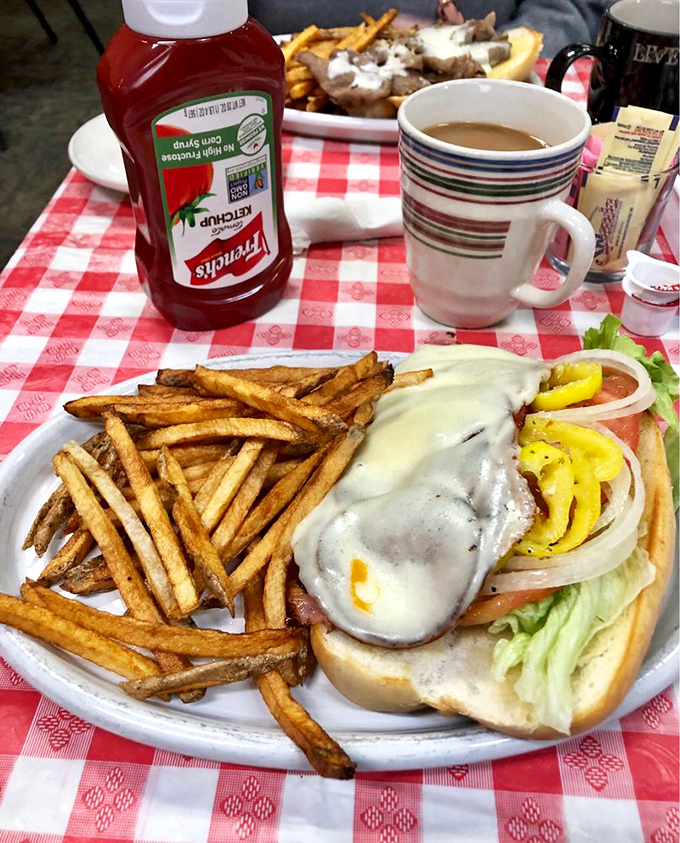 A sandwich so loaded with goodness it requires strategic planning to eat&mdash;the kind of meal that demands both hands and your complete attention.